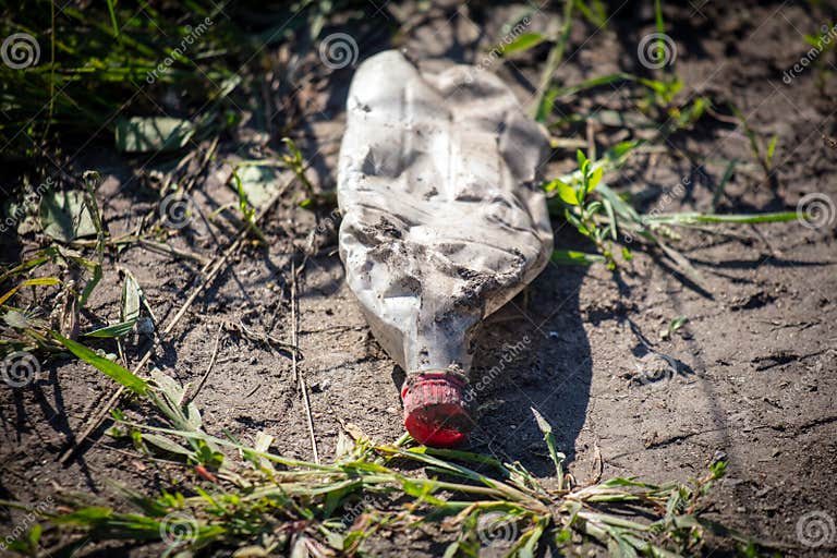 Plastic Bottle on the Ground in Nature. Stock Image - Image of rubbish ...