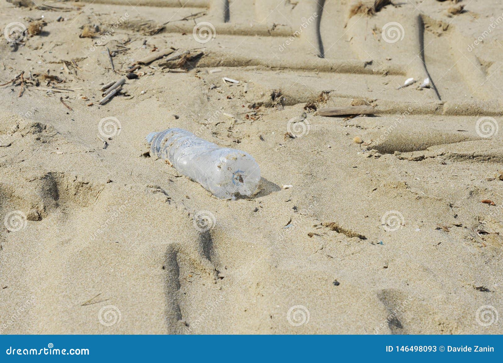 Plastic Bottle on the Sand. Garbage on the Beach. Dirty Sea Shore ...