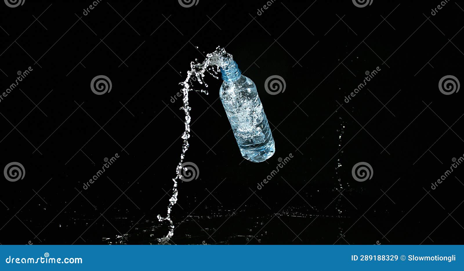 Plastic Bottle of Water Falling and Splashing Against Black Background ...