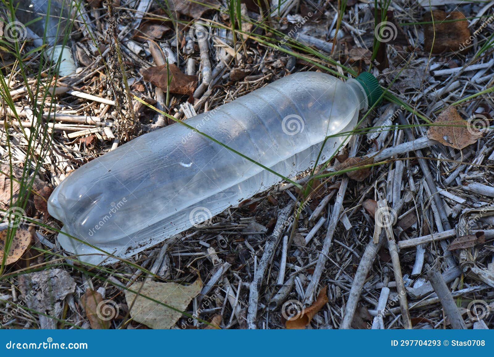 Plastic Bottle with Water Inside on the Ground Stock Image - Image of ...