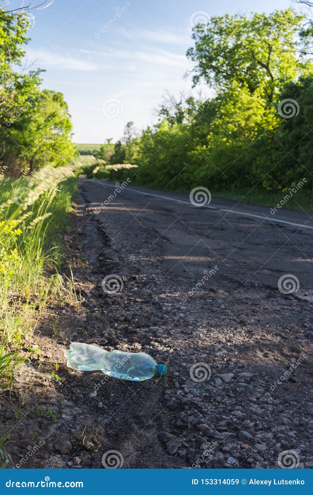 Plastic Bottle with Water by the Road Stock Image - Image of filth ...