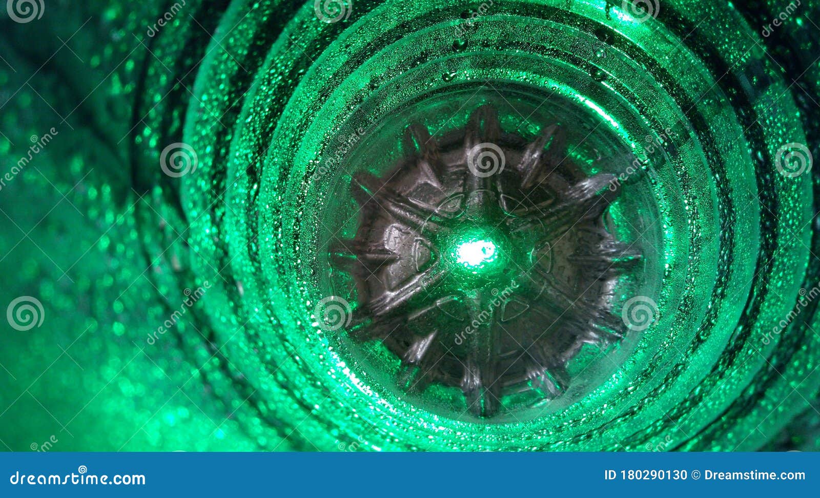 A Plastic Bottle Whose Surface is Covered with Luminous Water Droplets ...