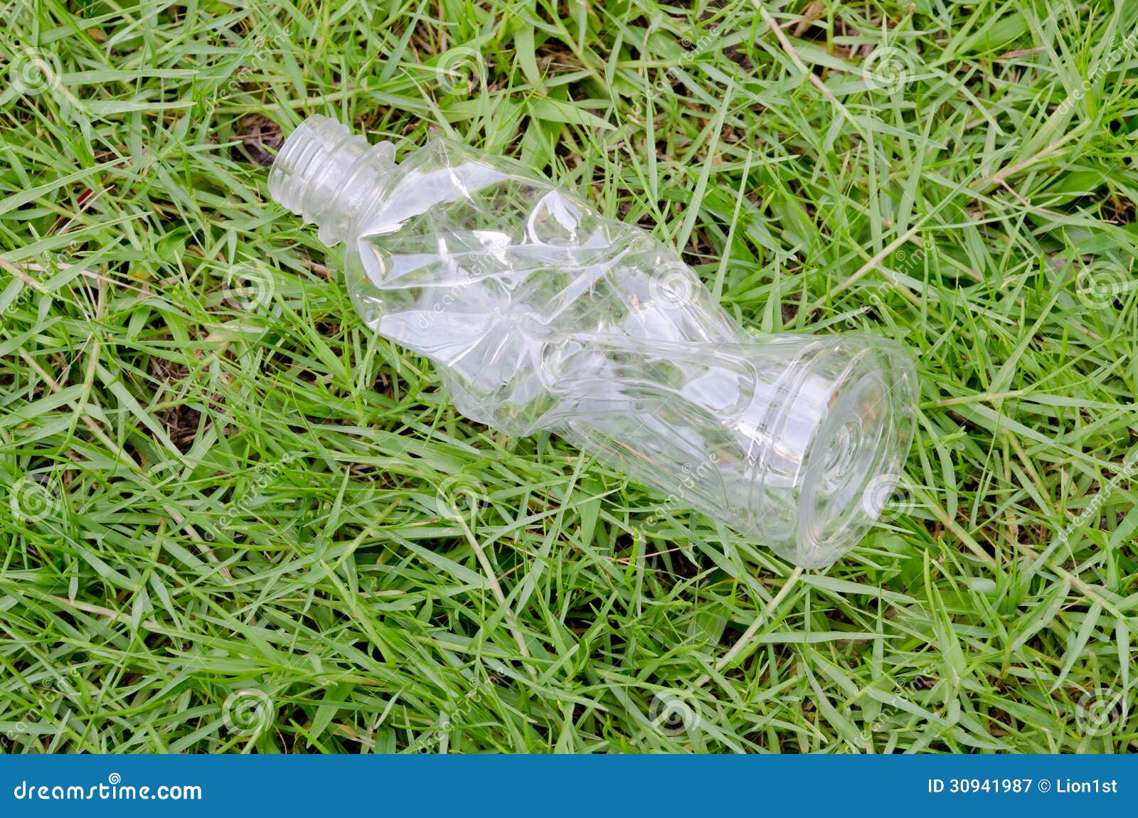 Plastic bottle on the yard stock image. Image of environment - 30941987