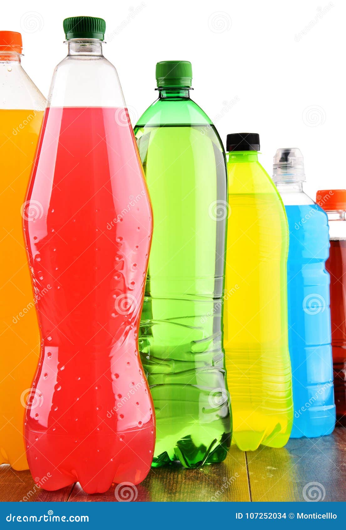 Plastic Bottles of Assorted Carbonated Soft Drinks Over White Stock ...