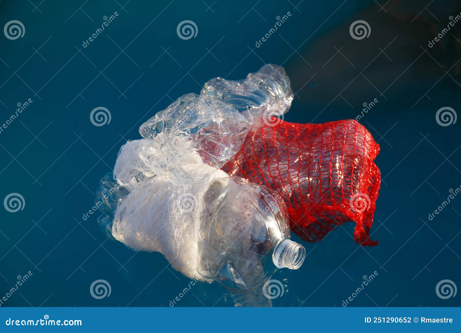 Plastic Bottles With Net Bags Floating In The Water, Plastic Pollution ...