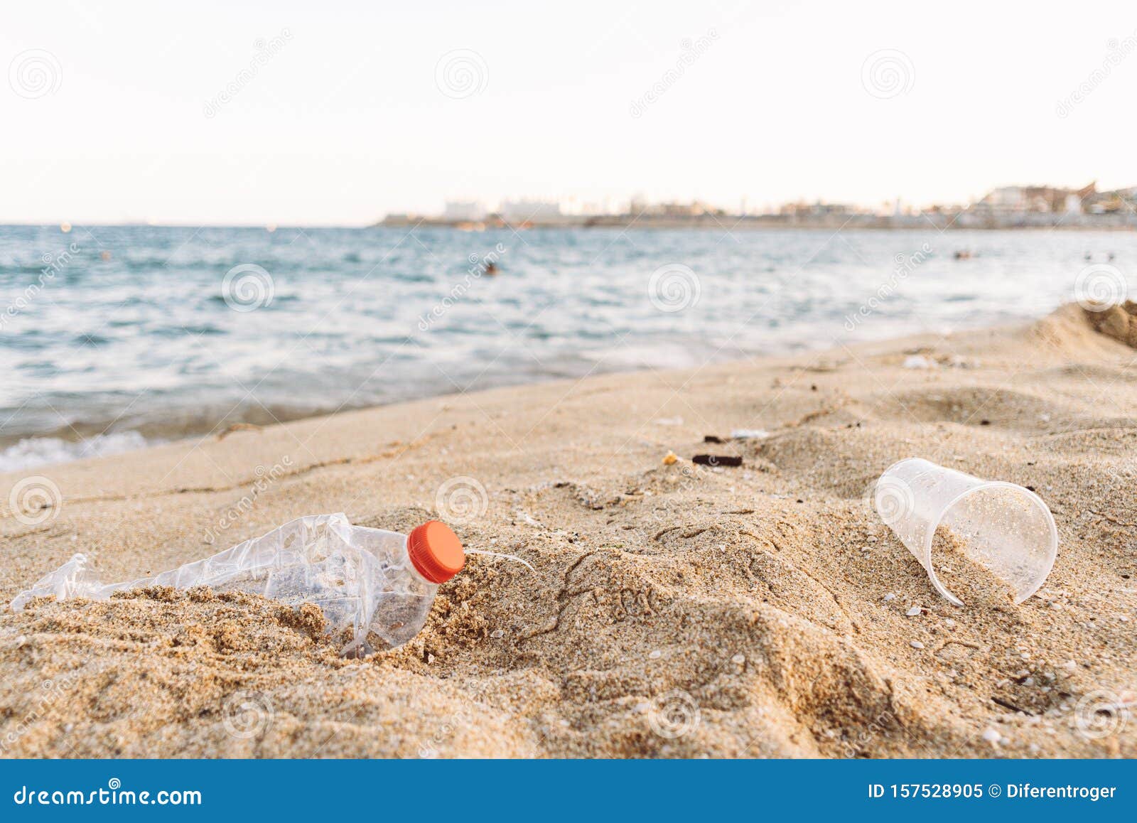 Plastic on the beach stock image. Image of ocean, plastic - 157528905