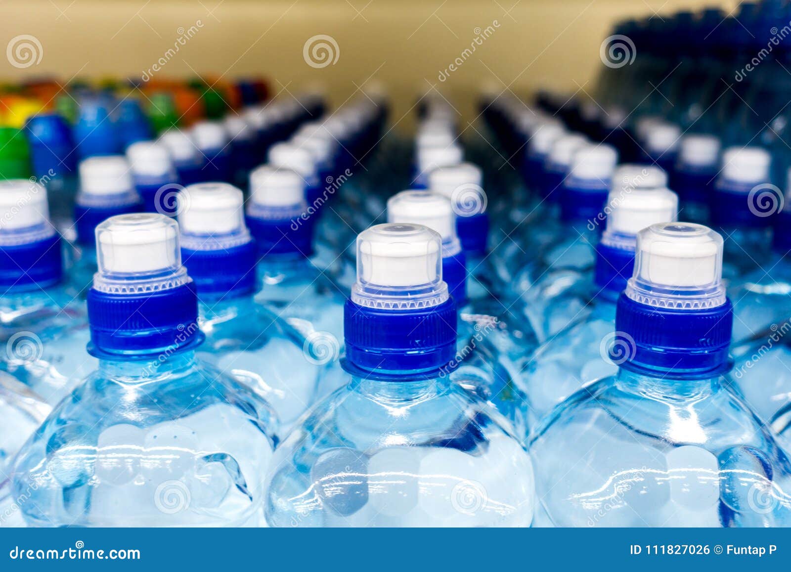 Plastic Bottles with Water, Color Caps Stock Photo - Image of drink ...