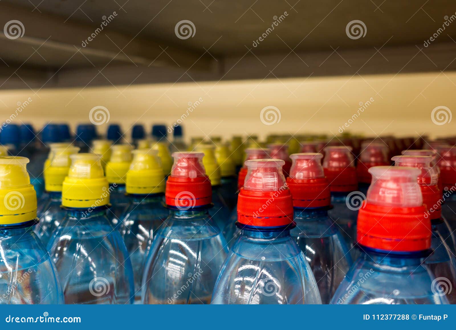 Plastic Bottles with Water, Color Caps Stock Photo - Image of caps ...