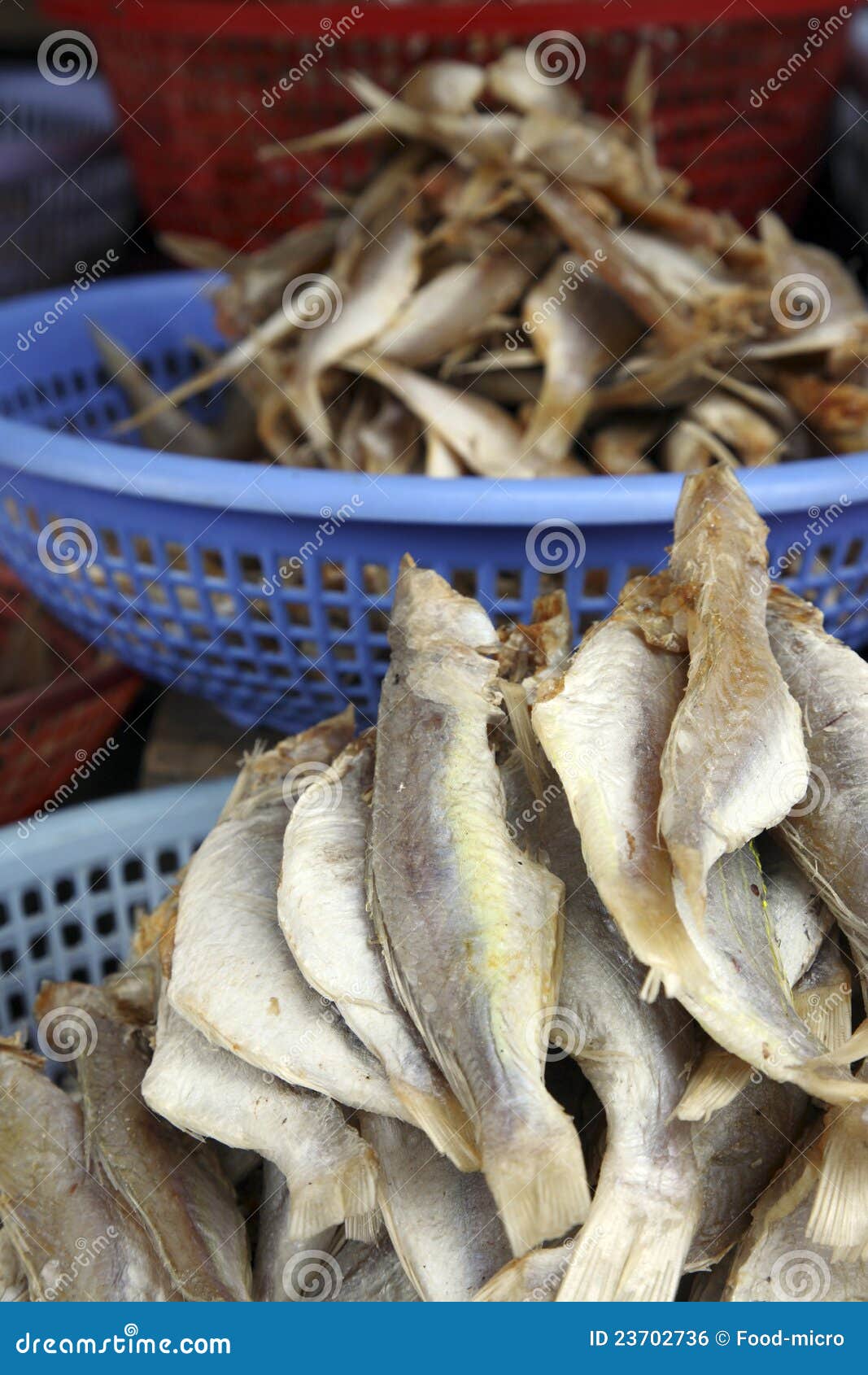 Plastic Bowls of Dried Fish Stock Photo - Image of pile, heap: 23702736