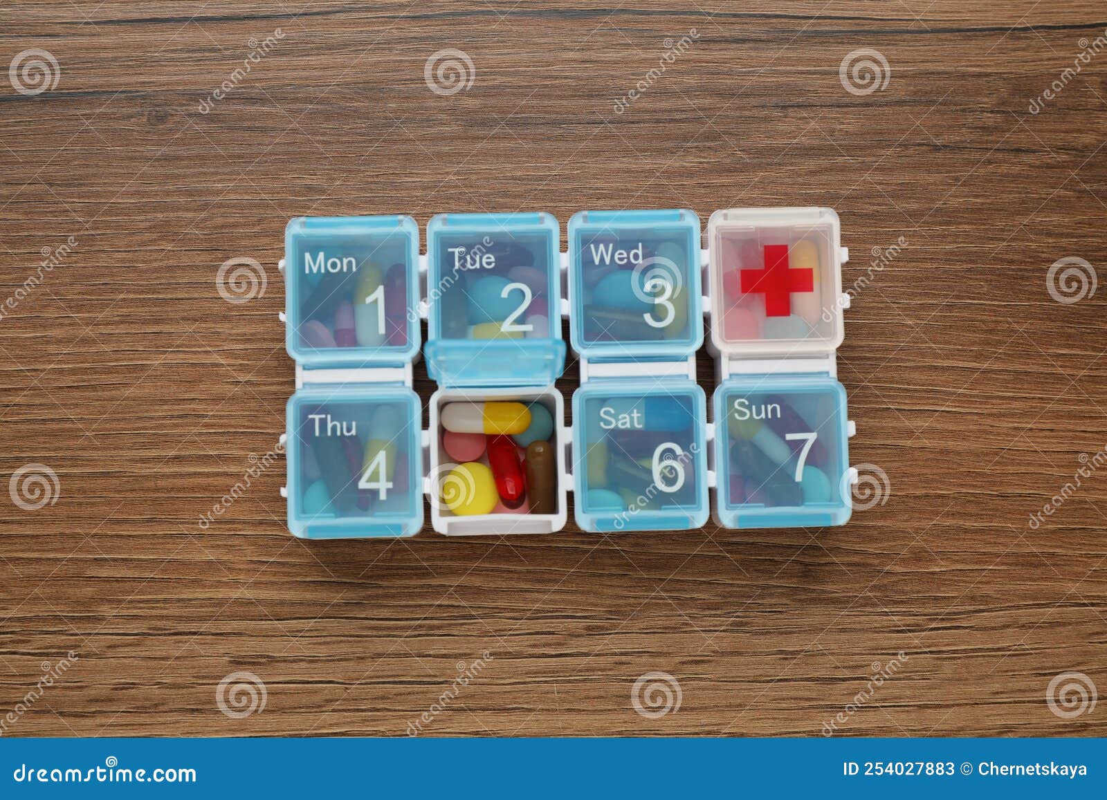Plastic Box with Different Pills on Table, Top View Editorial Stock ...
