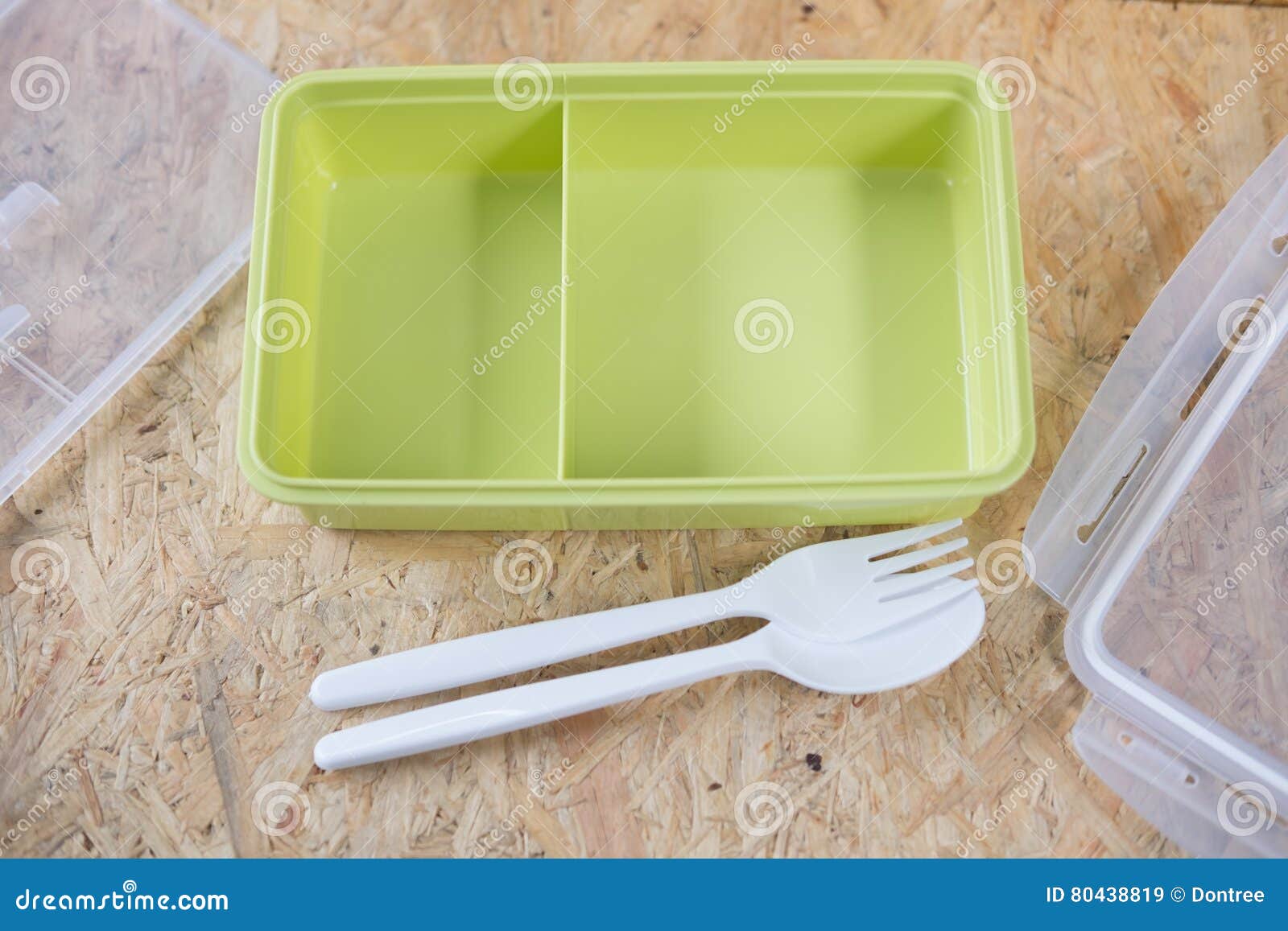 Plastic Box, Fork and Spoon on Wood Table Stock Image - Image of green ...