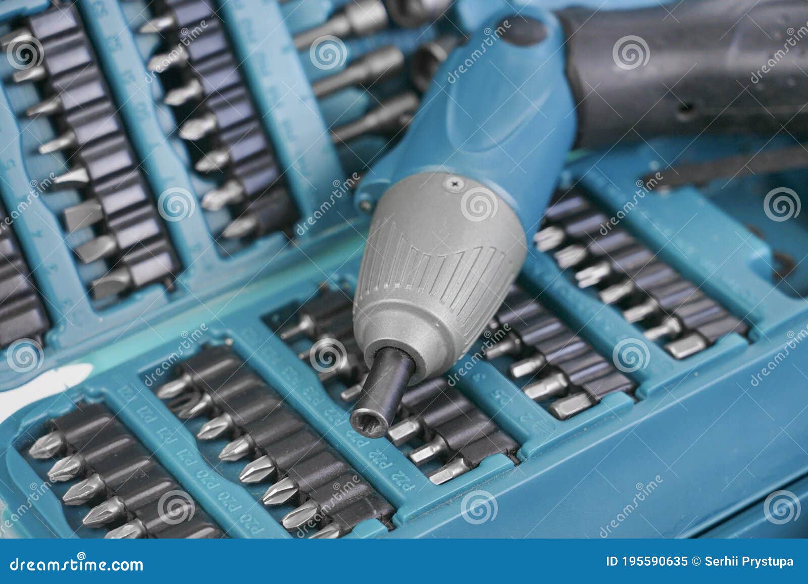 Electric Screwdriver Lies Next To the Drawer with a Set of Screwdrivers ...