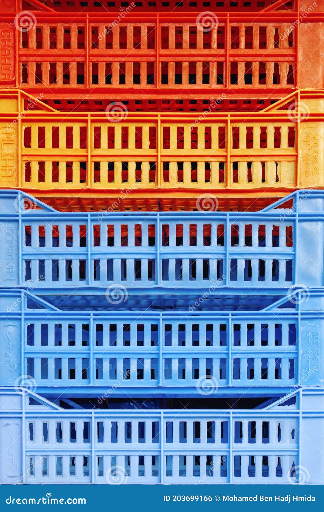 Plastic boxes one by one. stock photo. Image of colored - 203699166