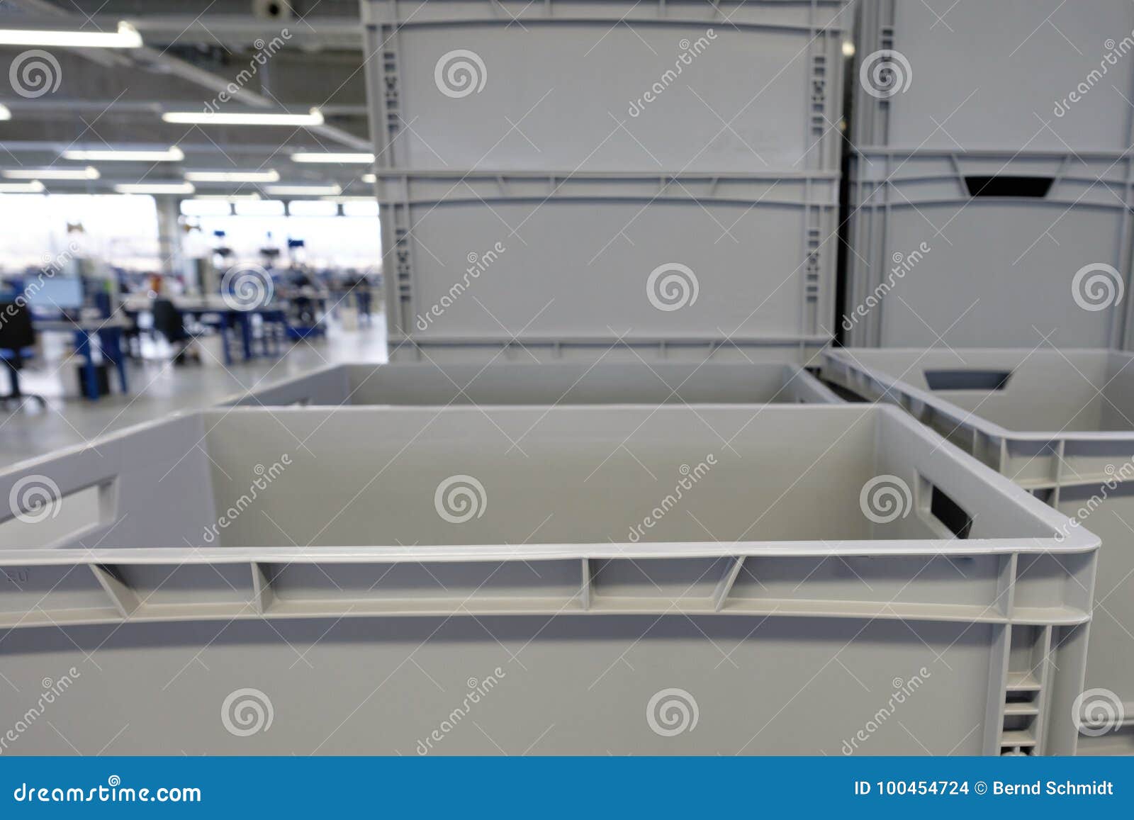 Plastic Boxes in a Production Hall Stock Photo - Image of hall, crates ...
