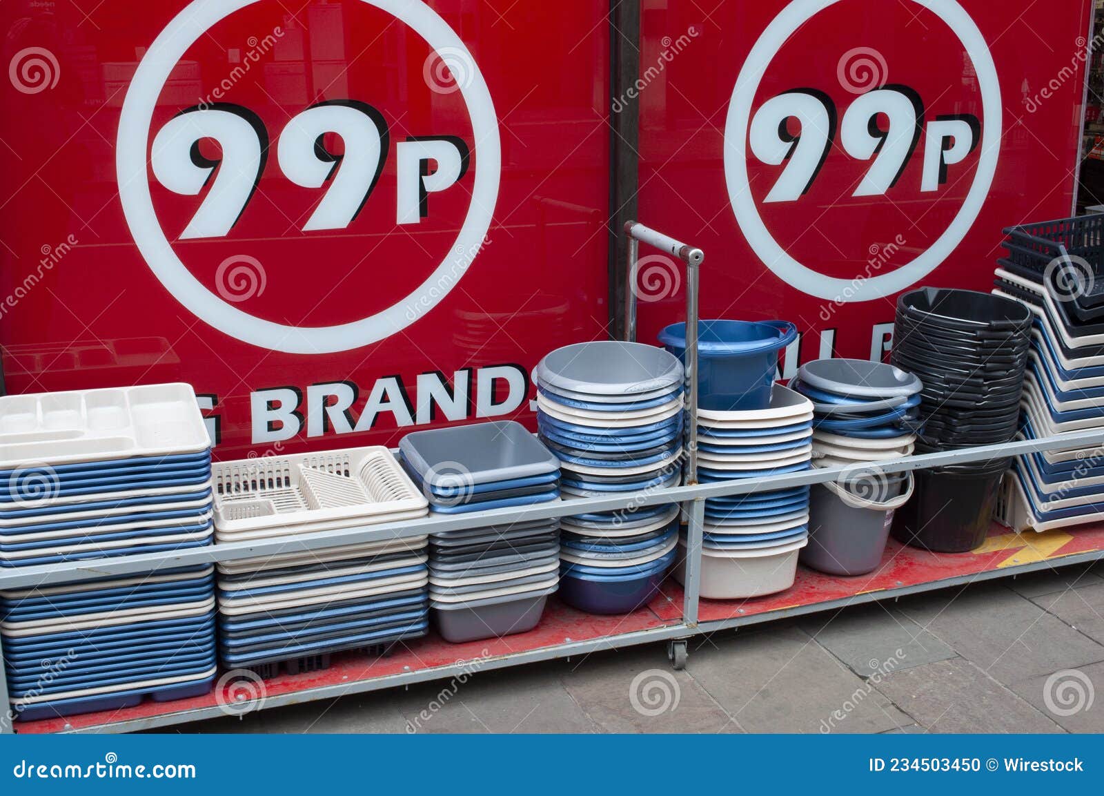 Plastic Buckets and Kitchenware on Display Outside a Budget Store ...
