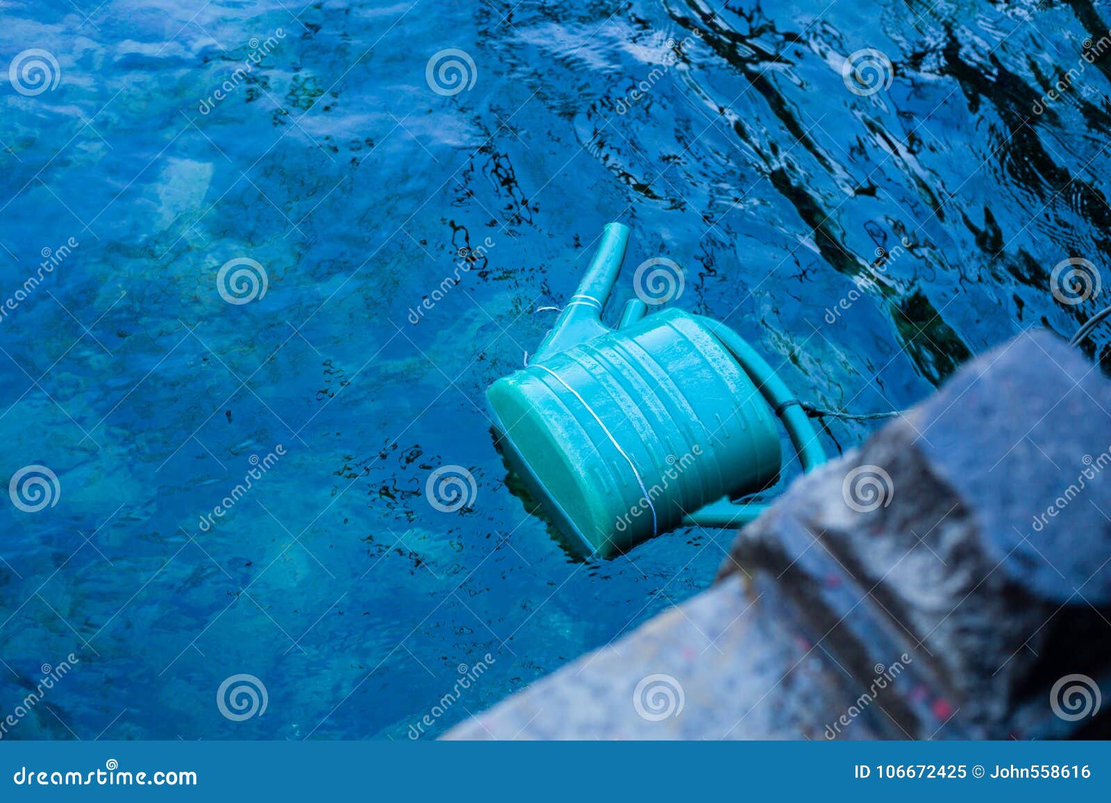 Plastic Buckets in the Water Stock Image - Image of watering, buckets ...
