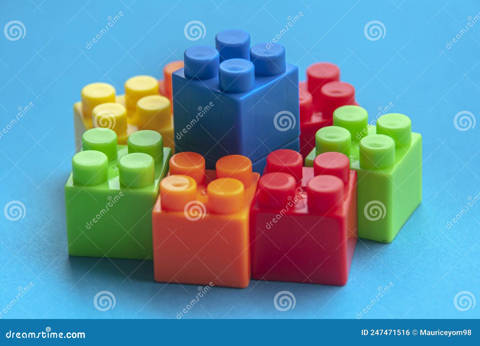 Plastic Building Blocks on Blue Background. Educational Concept Stock ...