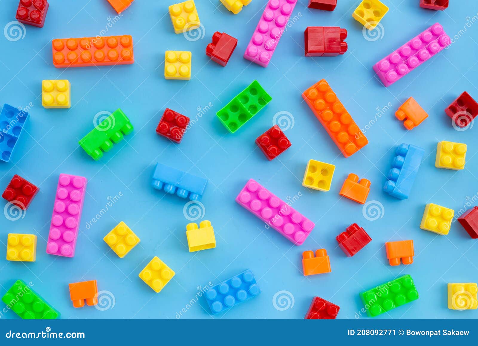 Plastic Building Blocks on Blue Stock Image - Image of block ...