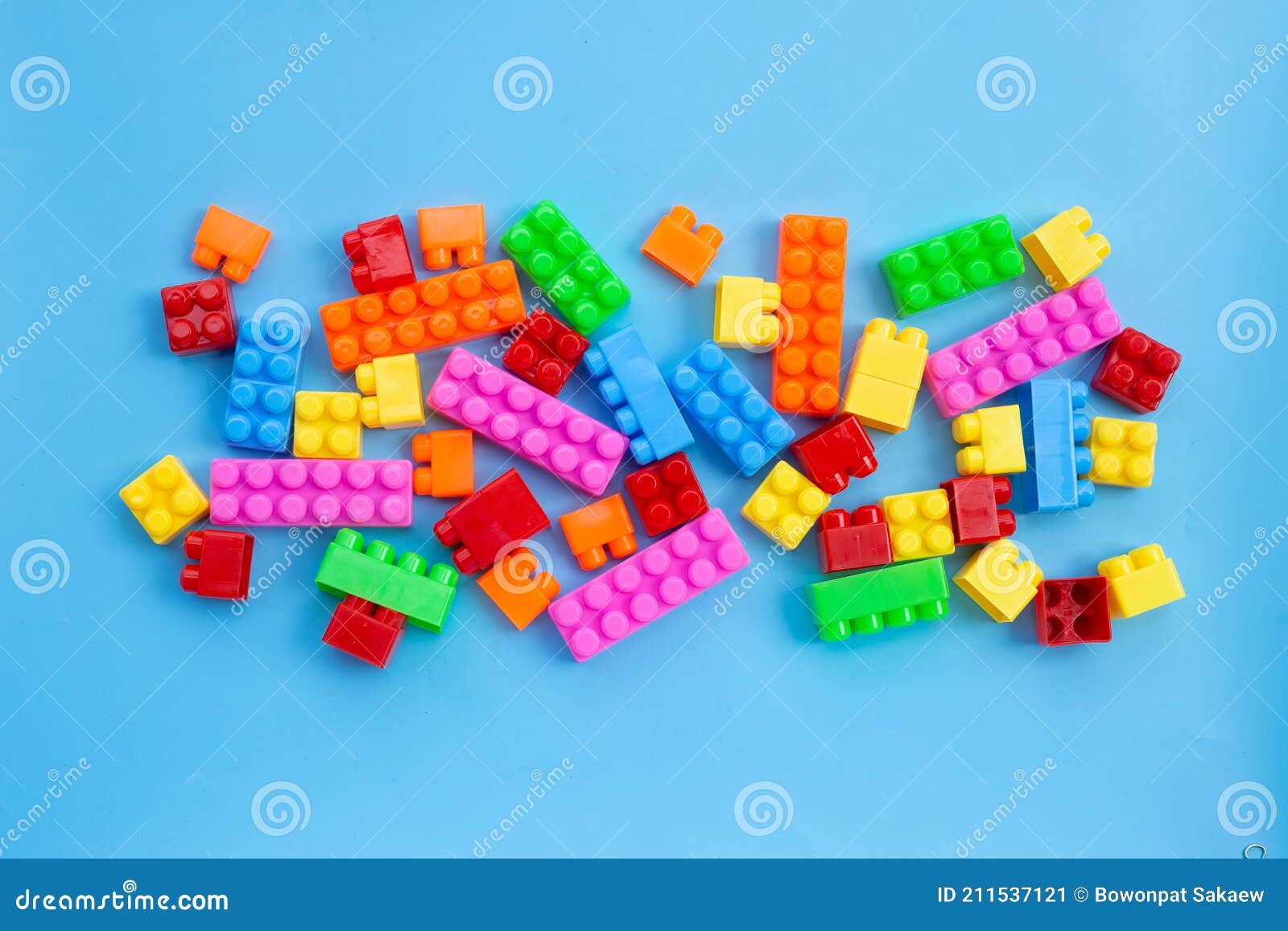 Plastic Building Blocks on Blue Stock Image - Image of game, block ...