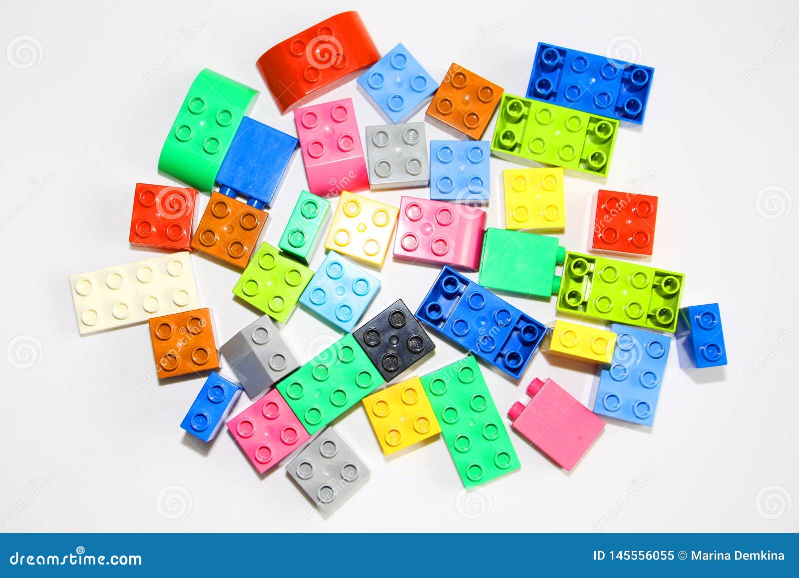 Plastic Building Blocks on a White Background. Multi-colored Cubes ...