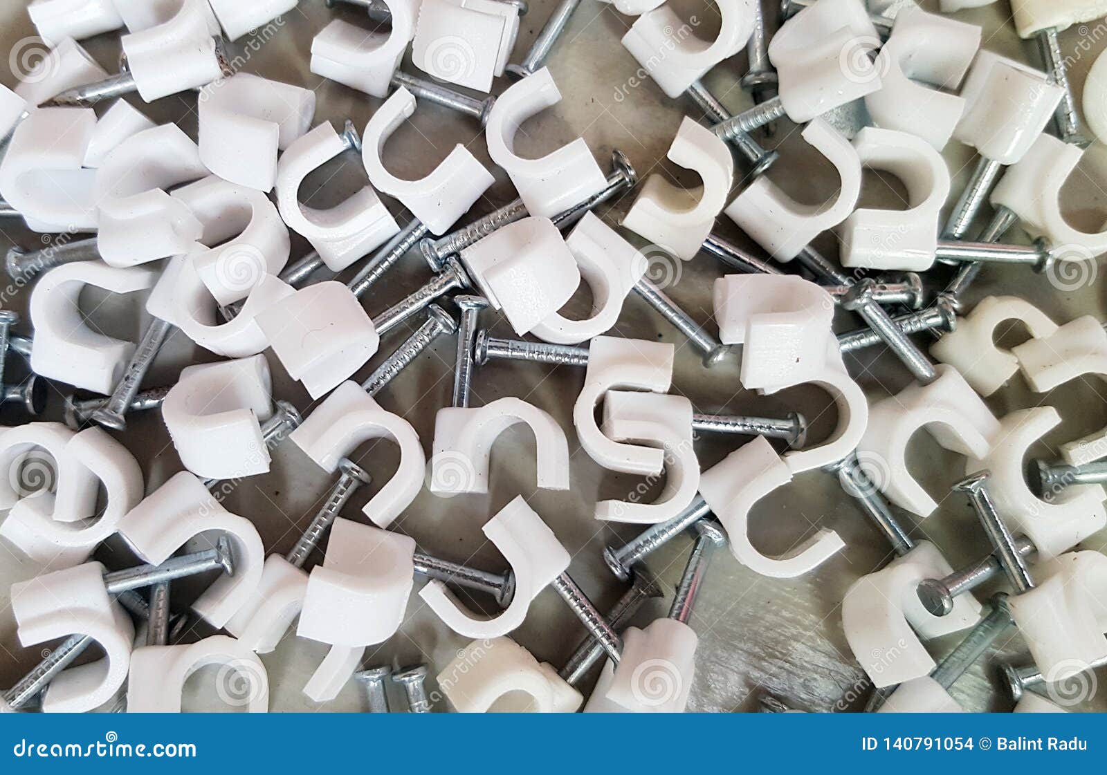 Plastic Cable Clips with Steel Nails Stock Photo - Image of curve ...