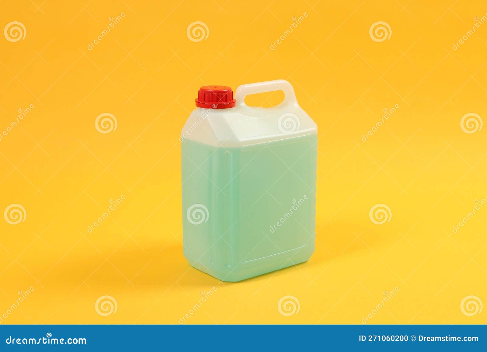 Plastic Canister with Green Liquid on Orange Background Stock Photo ...