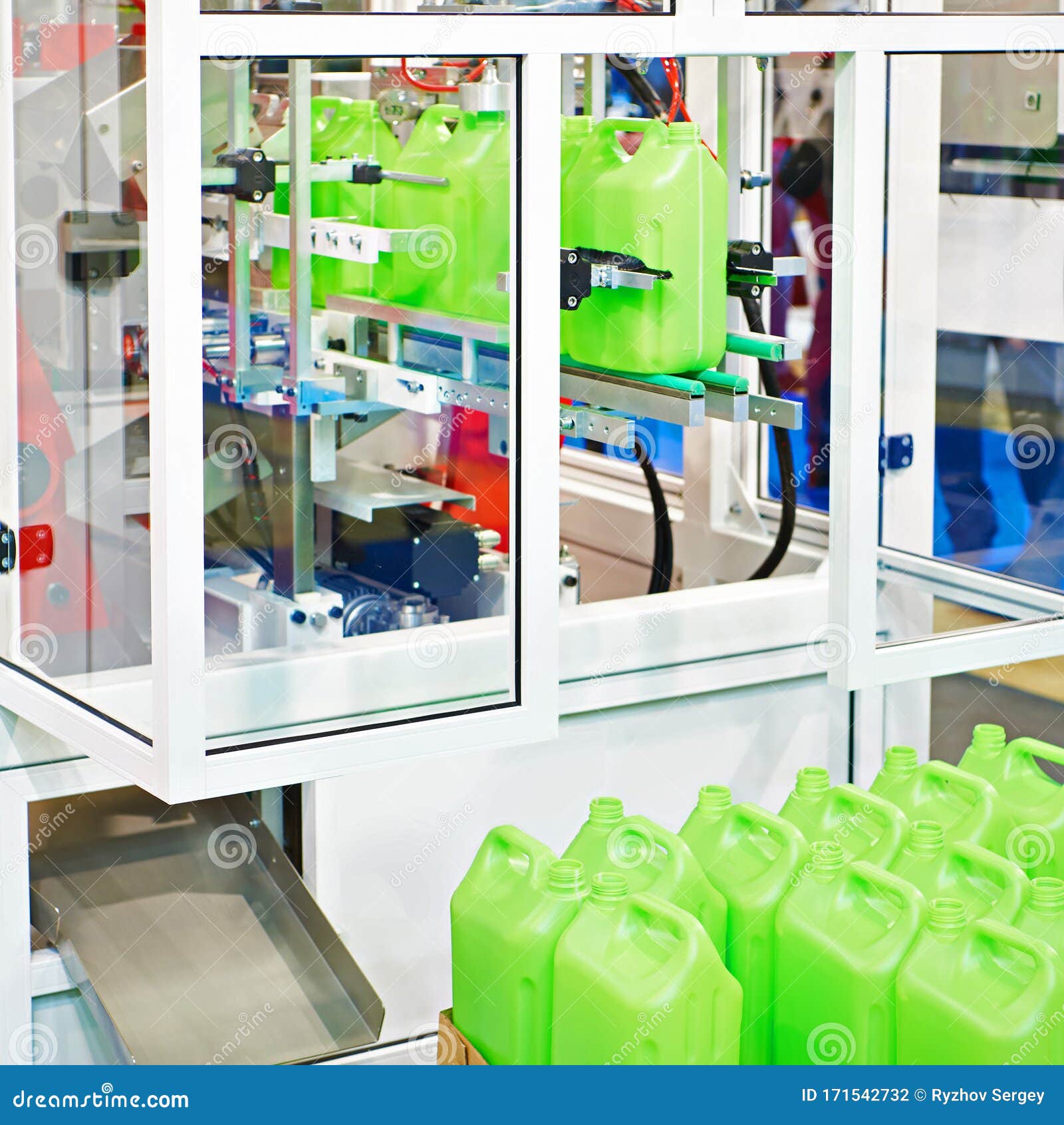 Plastic Cans on Factory Conveyor Stock Photo - Image of cans, factory ...