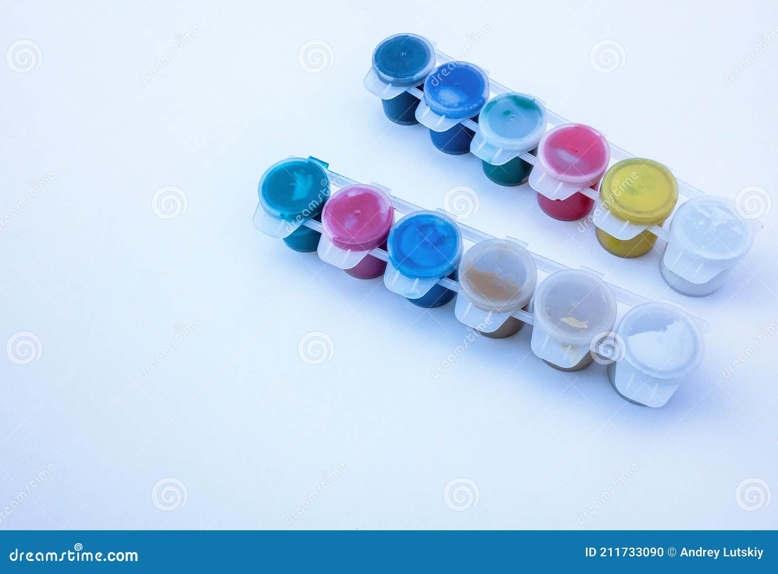 Plastic Cans with Paint of Different Colors for Drawing on White ...