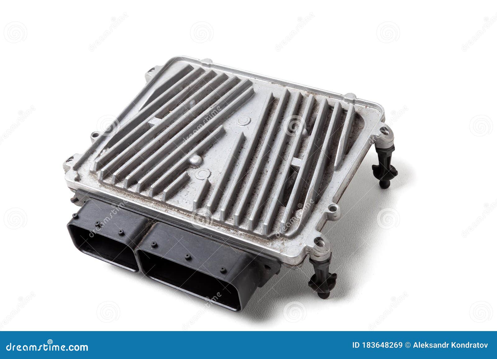 A Plastic Car Engine Control Unit with Metal Elements on a White ...