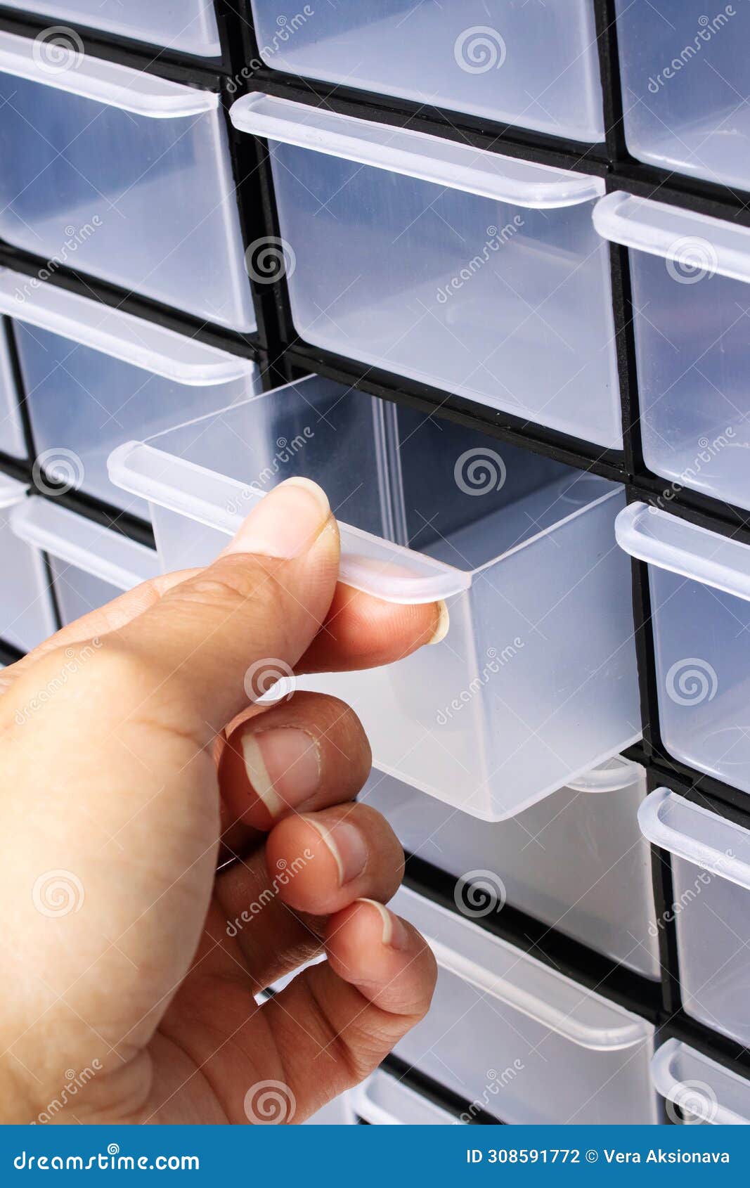 Plastic Cells in the Small Change Box and Hand Stock Photo - Image of ...