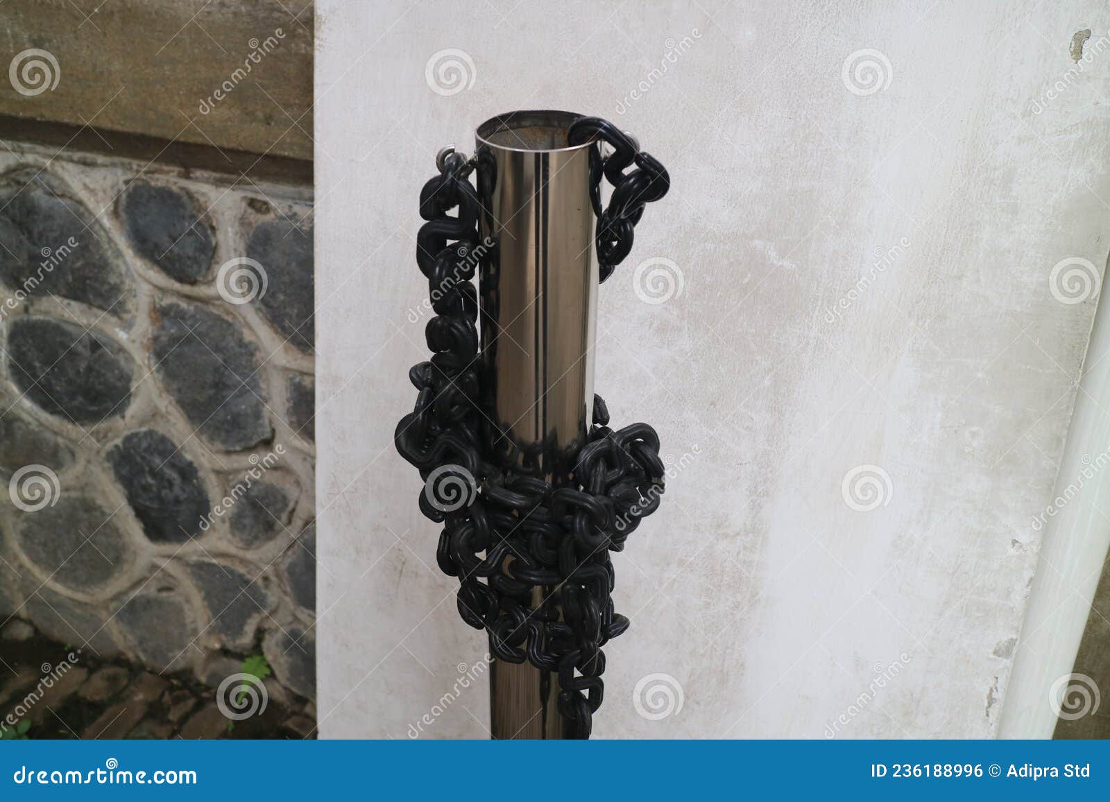Plastic Chain Wrapped Around an Iron Pipe Stock Photo - Image of ...