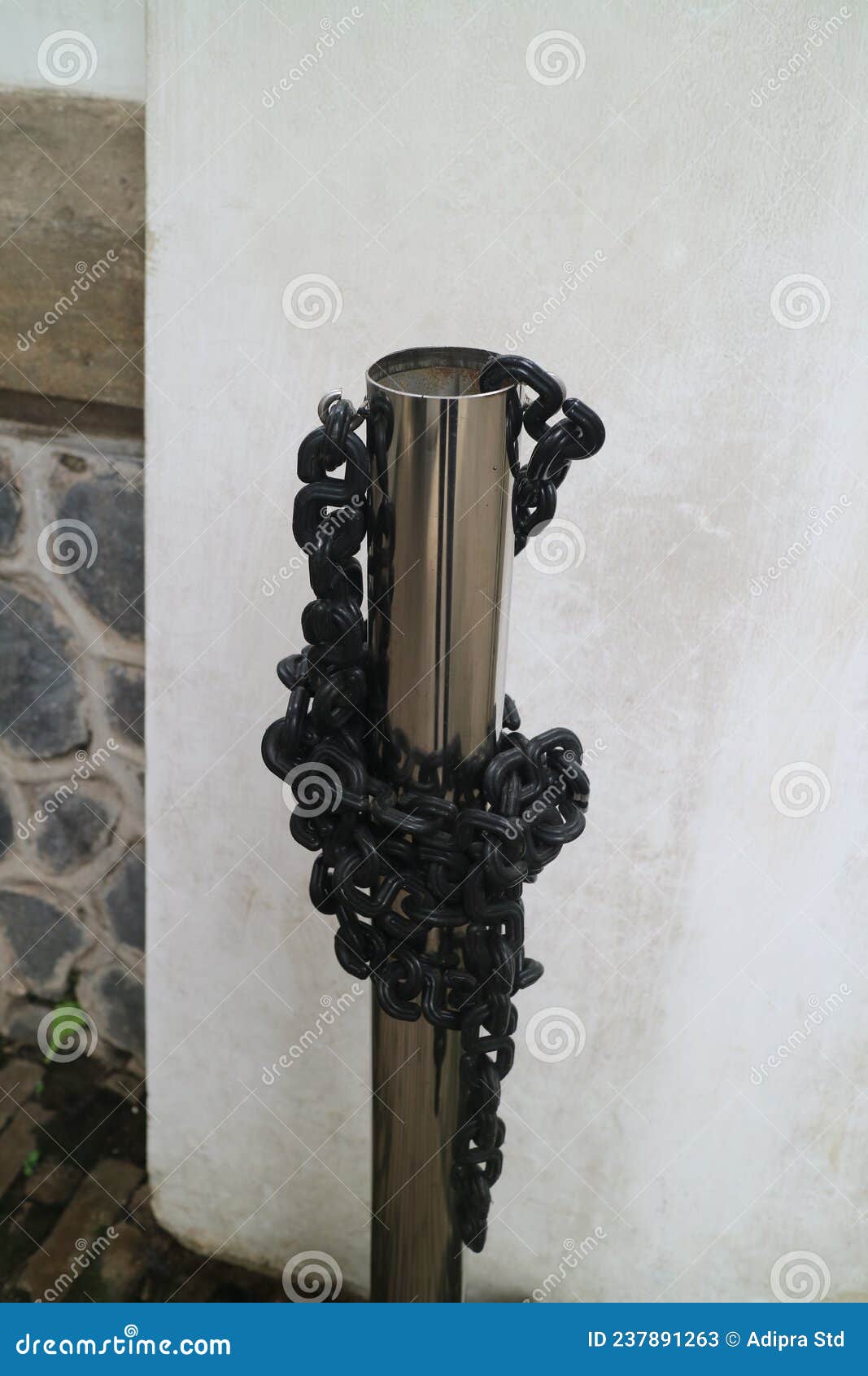 Plastic Chain Wrapped Around an Iron Pipe Stock Image - Image of ...