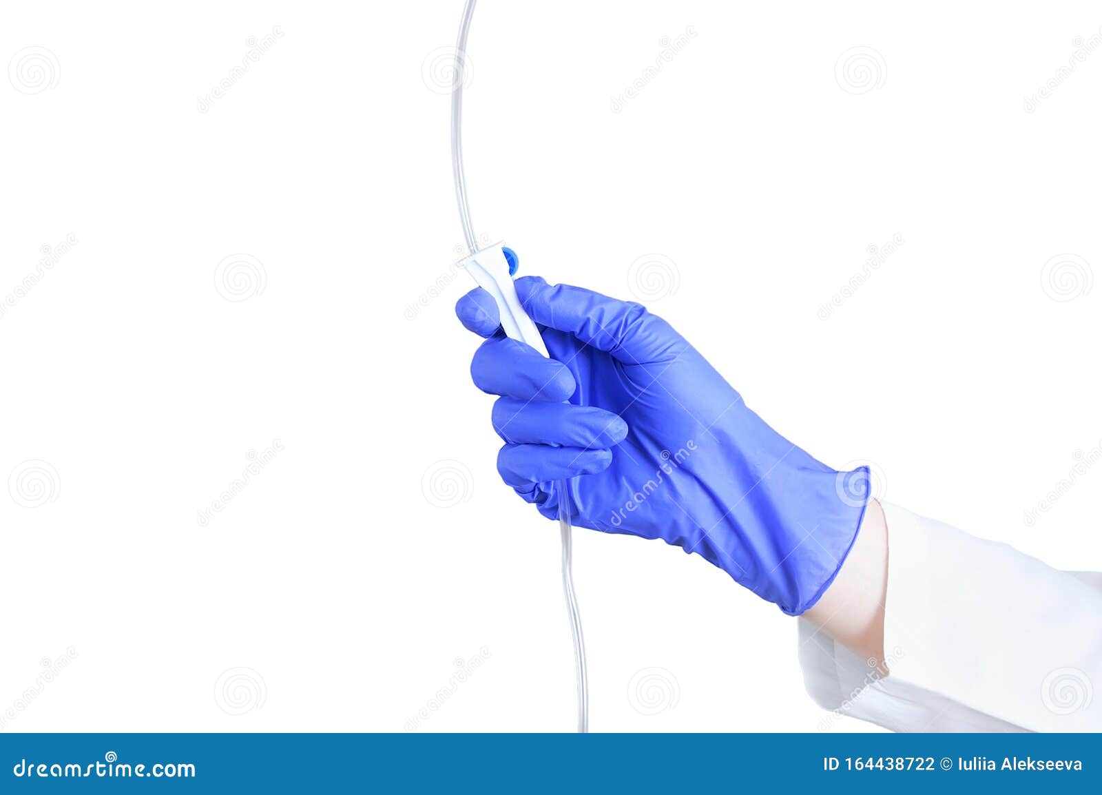 Plastic Clamp Infusion System in the Hands of a Nurse. White Isolate ...