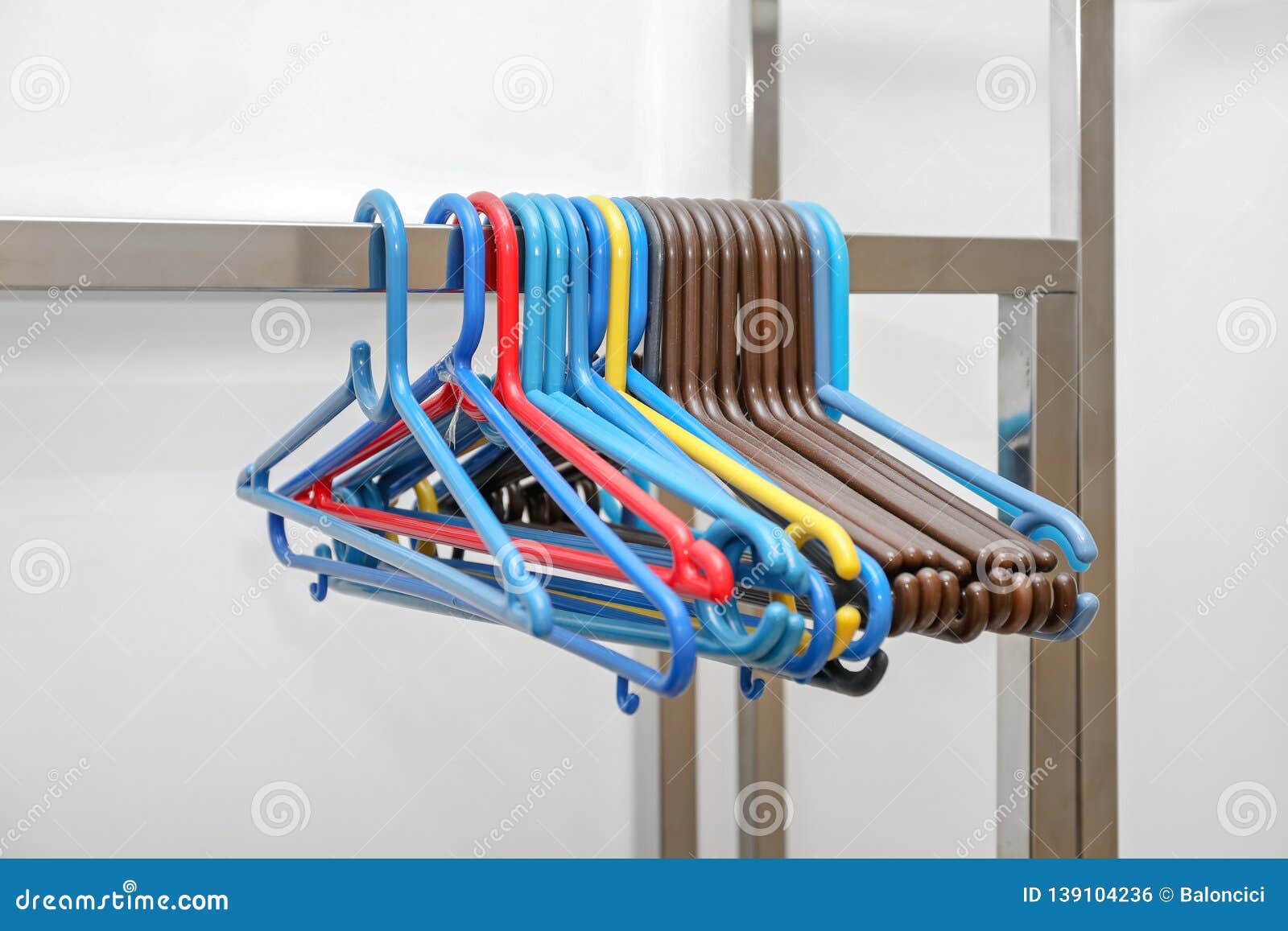 Plastic Clothes Hangers stock photo. Image of empty - 139104236