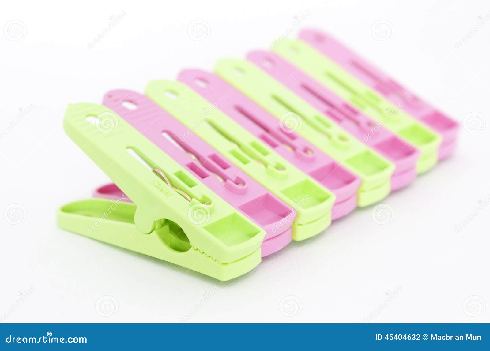 Plastic Clothes Pegs Over White Stock Photo - Image of green, item ...