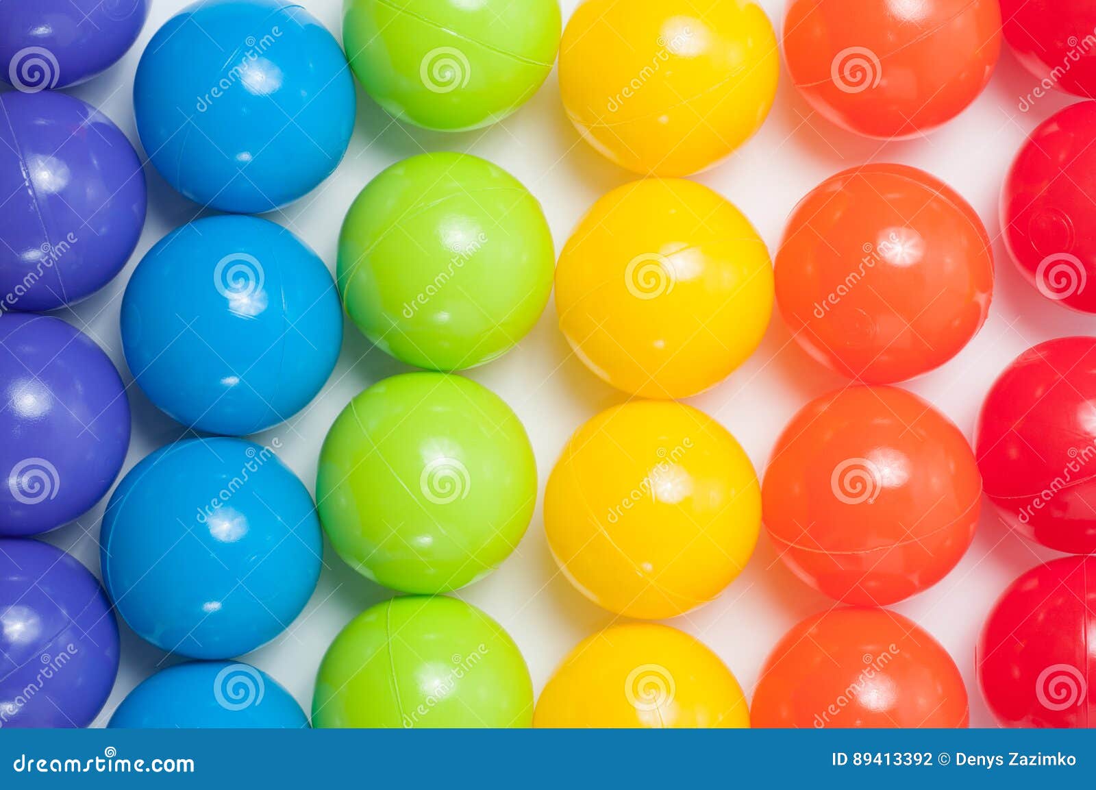 Plastic colored balls stock photo. Image of land, balls - 89413392
