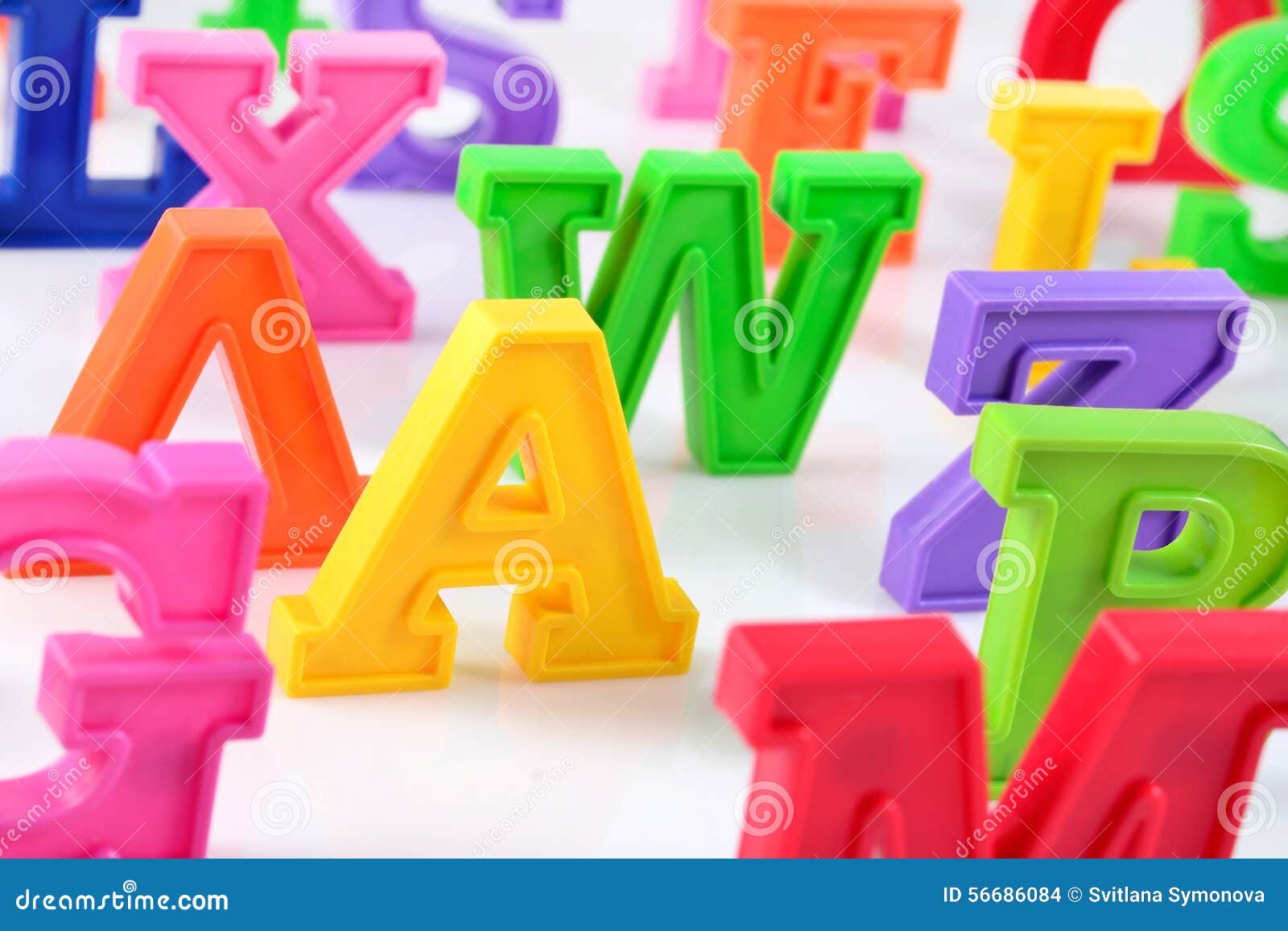 Plastic Colorful Alphabet Letters Close Up on a White Stock Photo ...