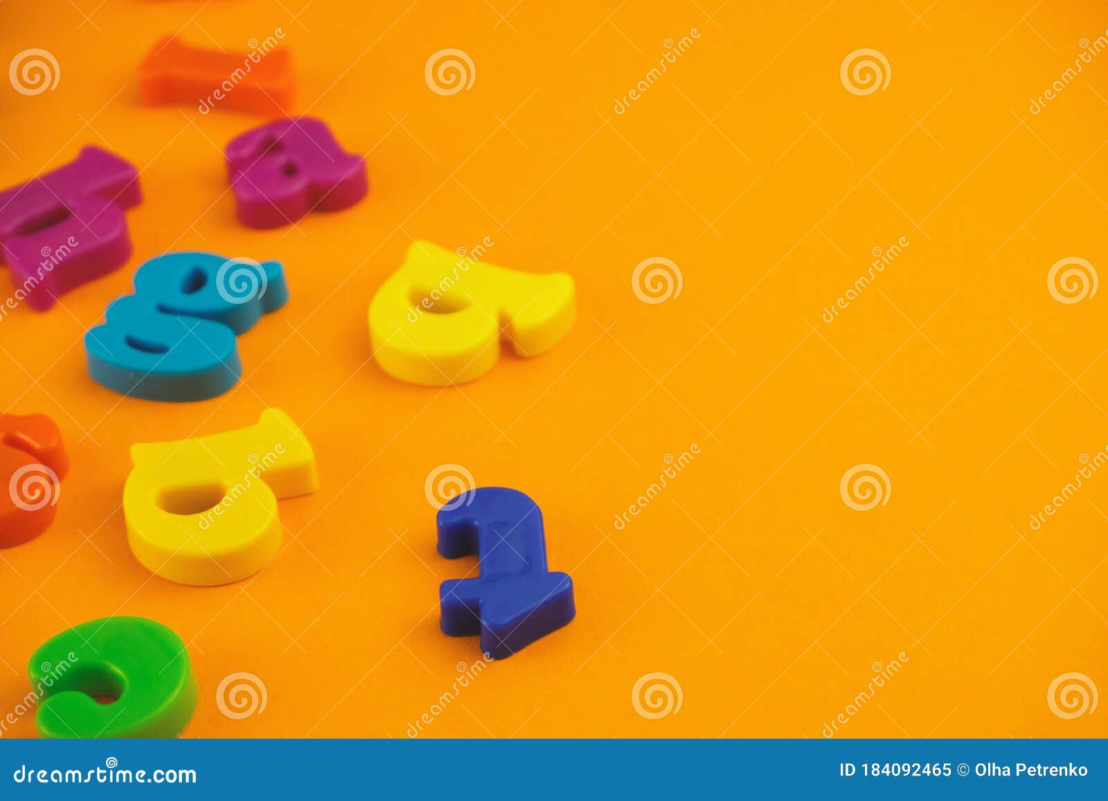 Plastic Colourful Alphabet Letters on the Orange Background Stock Image ...
