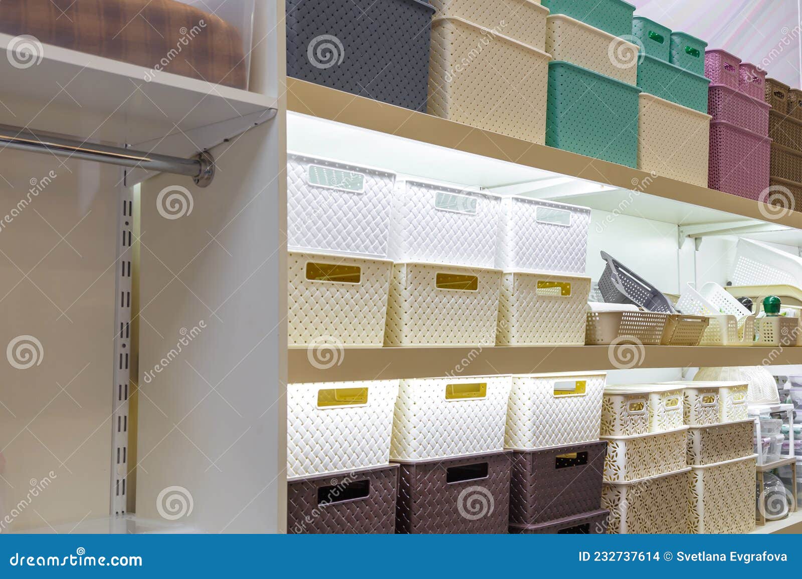 Plastic Container Boxes on a Shelf on a Rack for Organizing Home Space ...