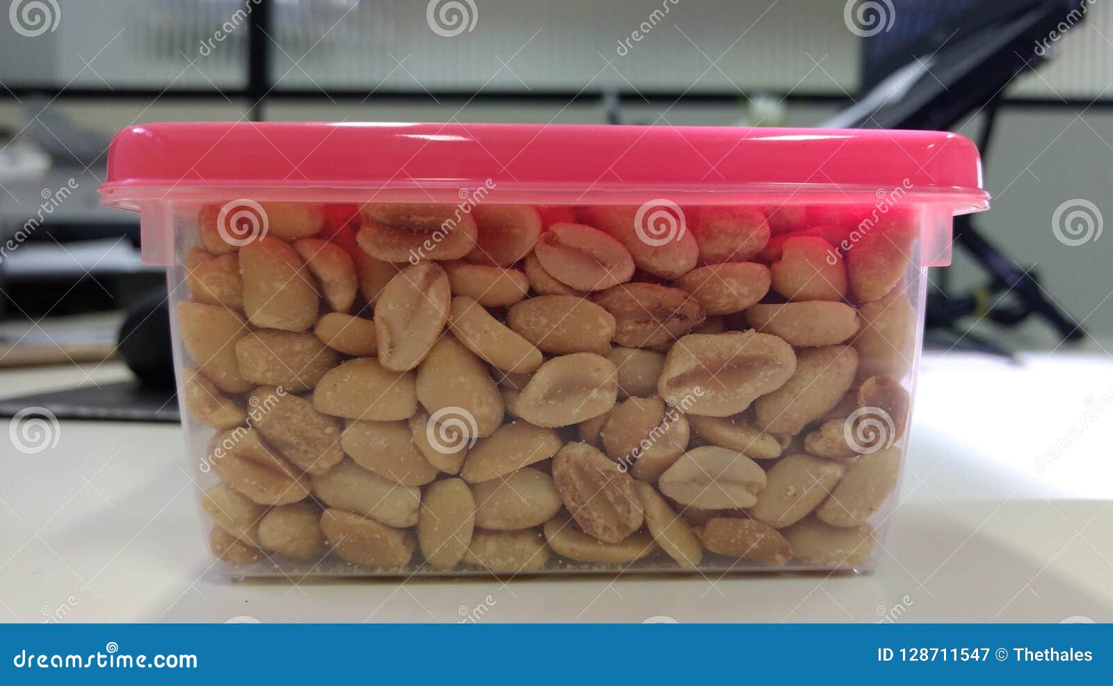 Plastic Container Filled with Skinless Peanuts Stock Image - Image of ...
