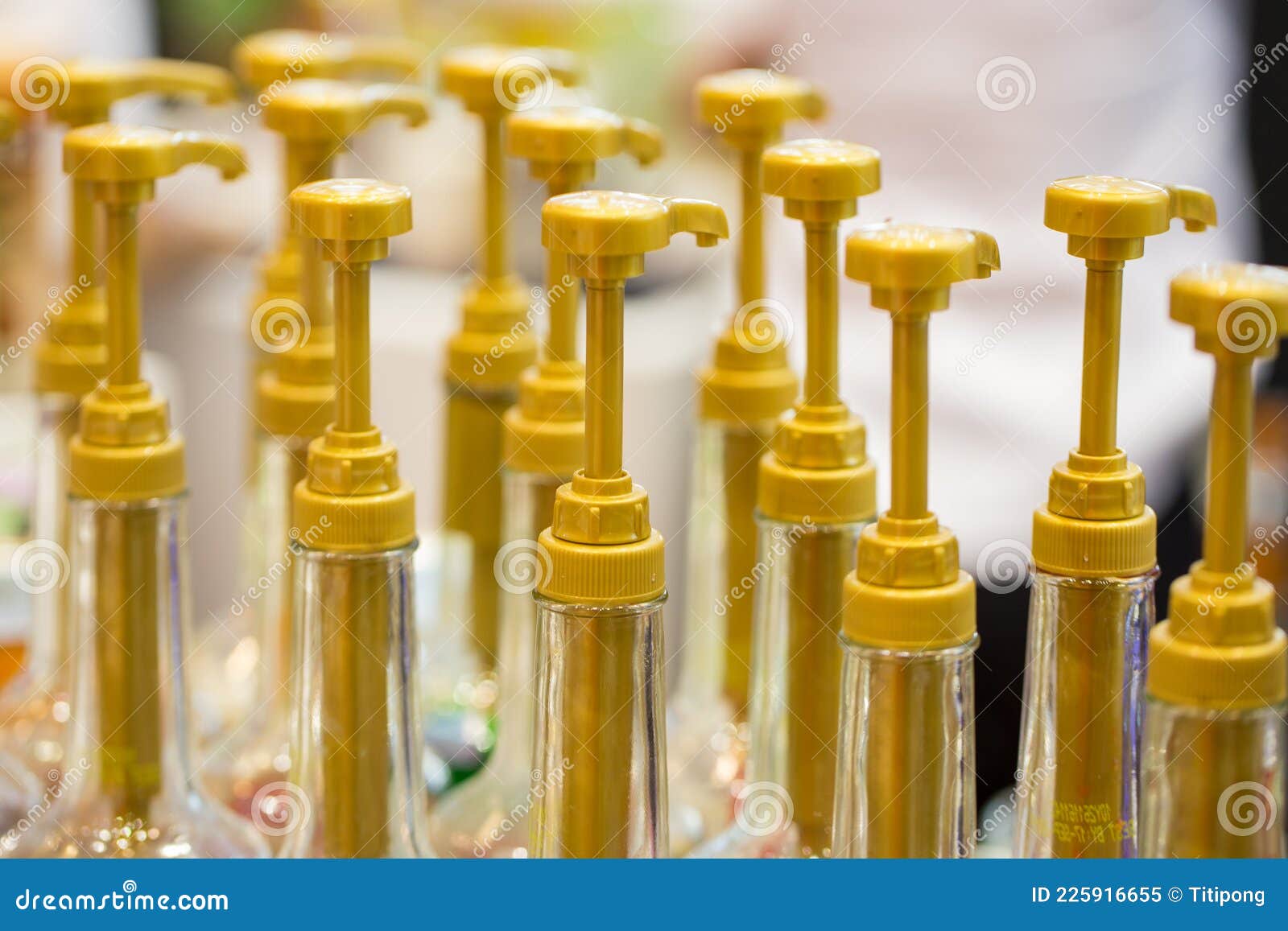 Bottle with gold pump stock image. Image of design, beauty - 225916655