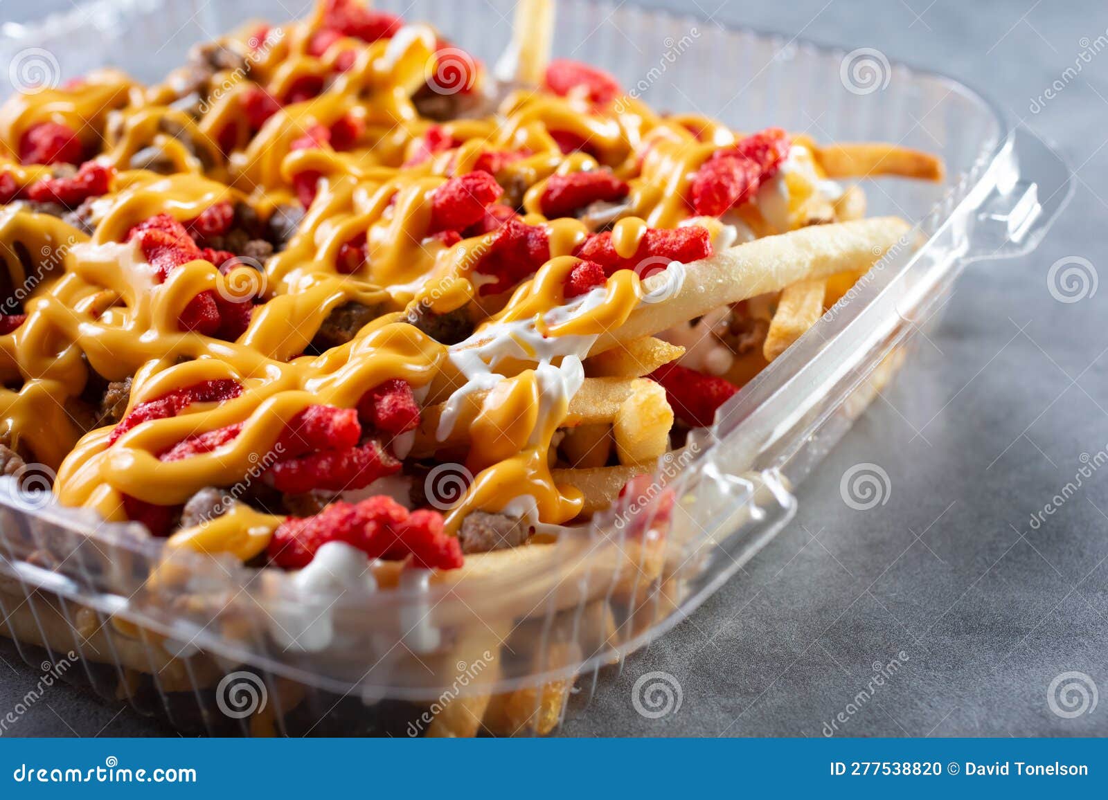 Plastic Container of Loaded French Fries Stock Photo - Image of menu ...