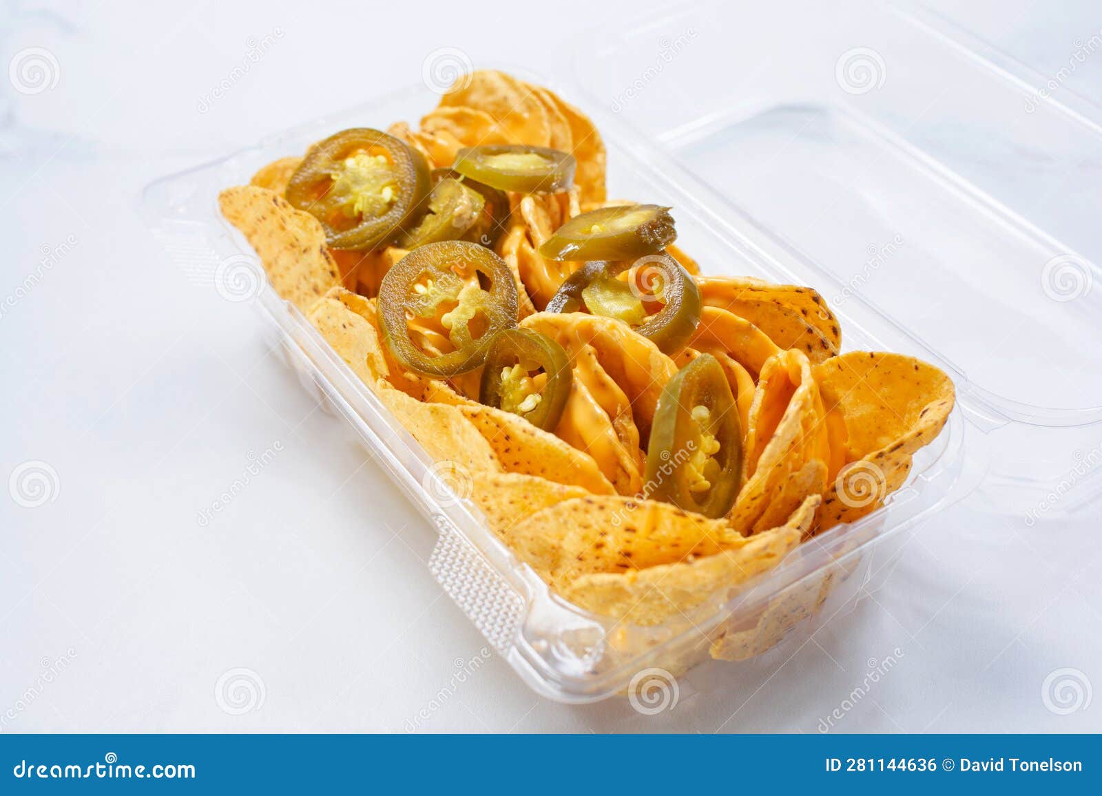 Plastic Container of Nachos Stock Photo - Image of texture, product ...