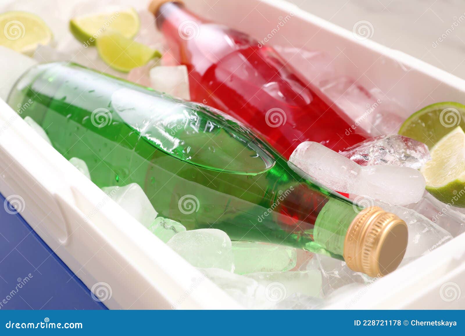 Plastic Cool Box with Ice Cubes and Refreshing Drinks, Closeup Stock ...