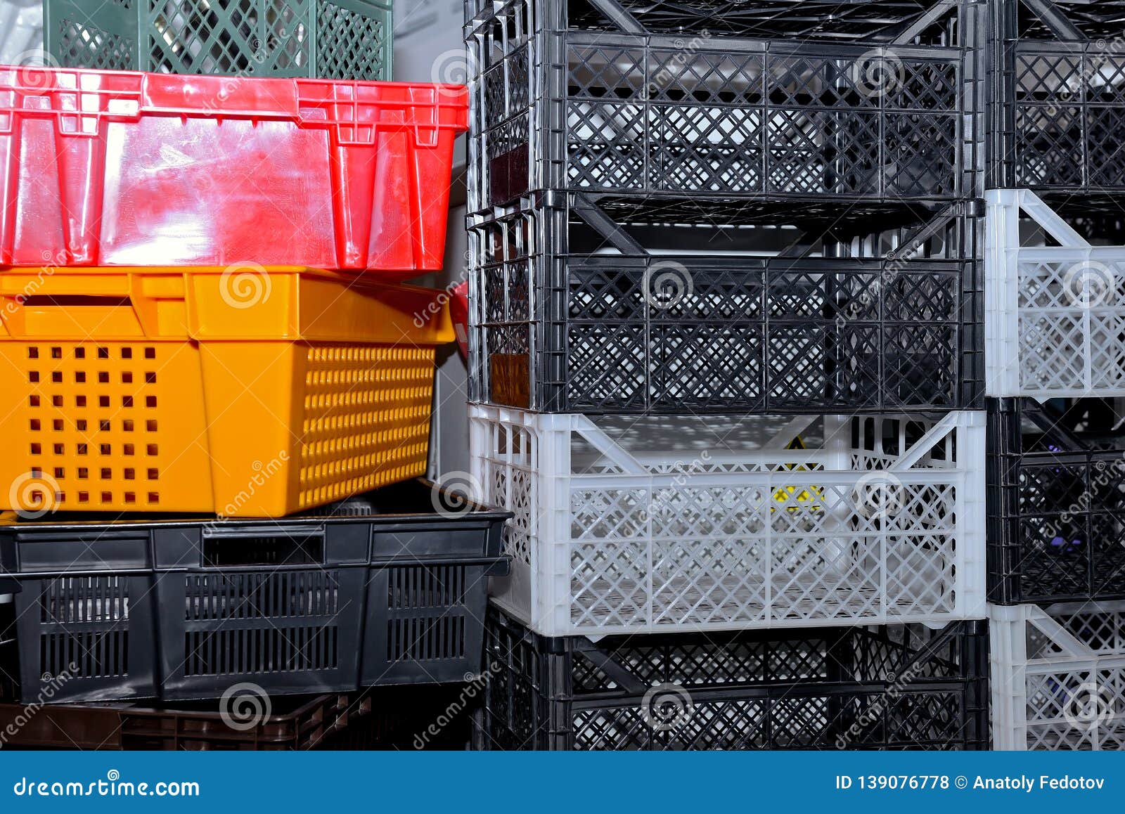 Plastic Crates, Containers of Various Colors and Sizes Stock Photo ...