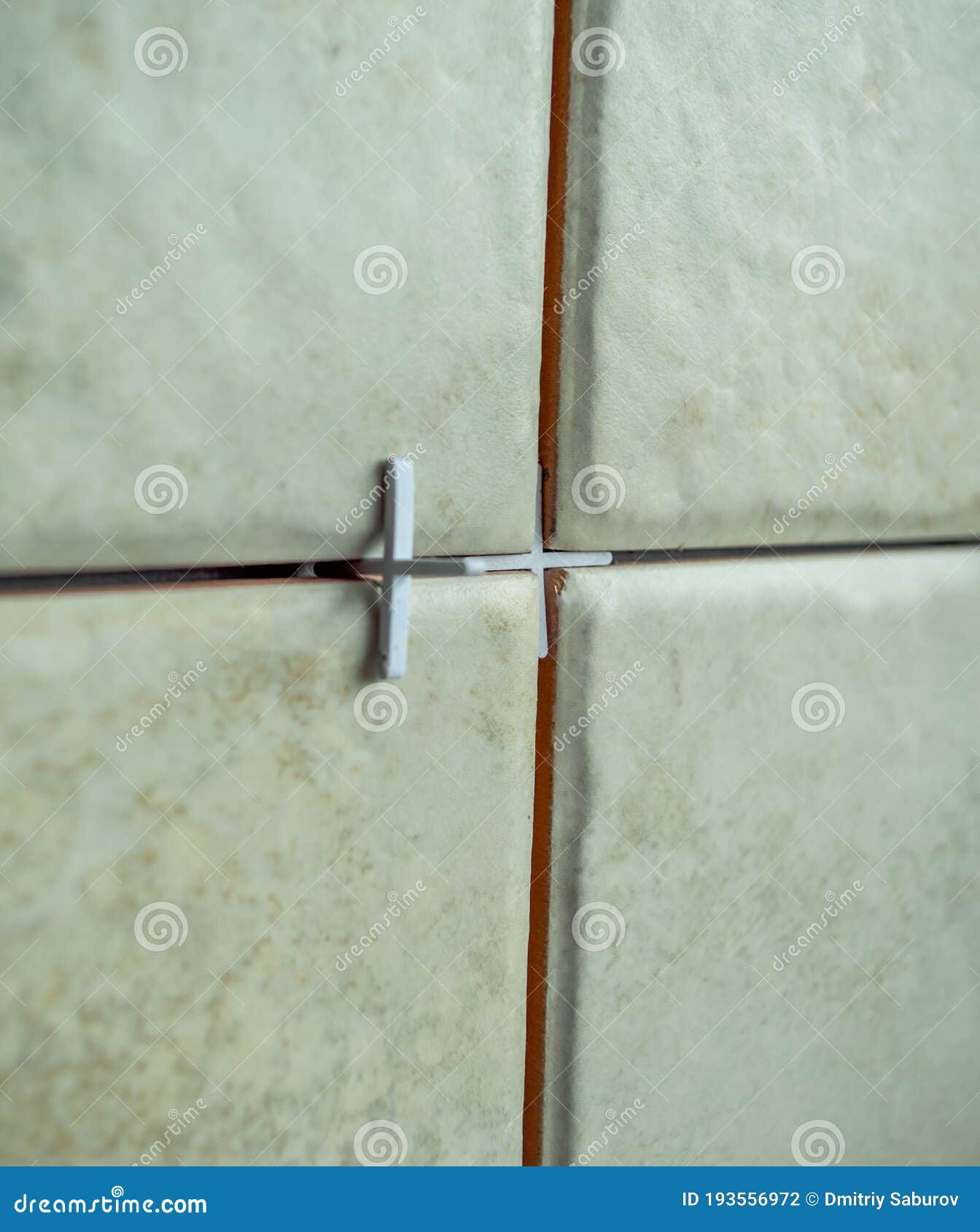 Plastic Cross. Leveling Tiles. Floor Tile Repair. Stock Photo - Image ...