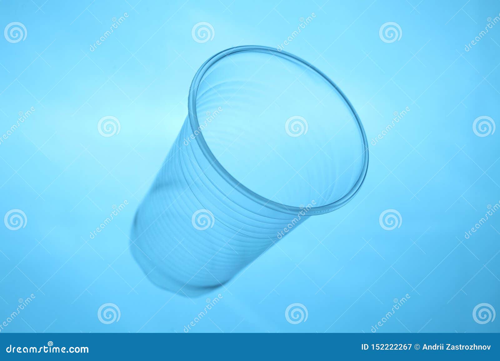Plastic Cup in Blue Water, Plastic Pollution of Oceans Stock Image ...