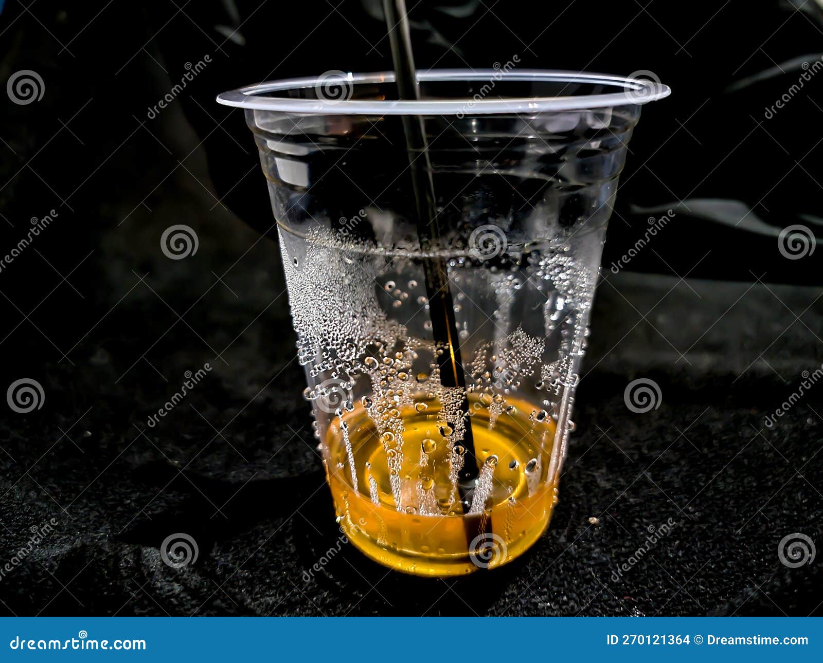 A Plastic Cup with a Charming Hint of Tea Stock Photo - Image of little ...