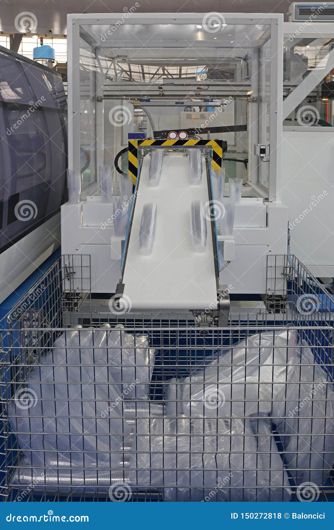 Plastic Cups Production stock photo. Image of manufacturing - 150272818