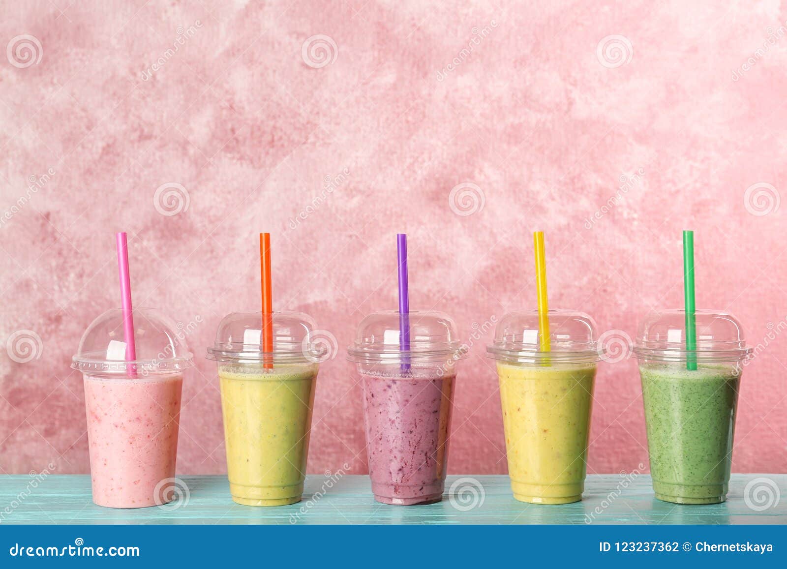 Plastic Cups with Smoothies on Table Stock Photo - Image of flavor ...
